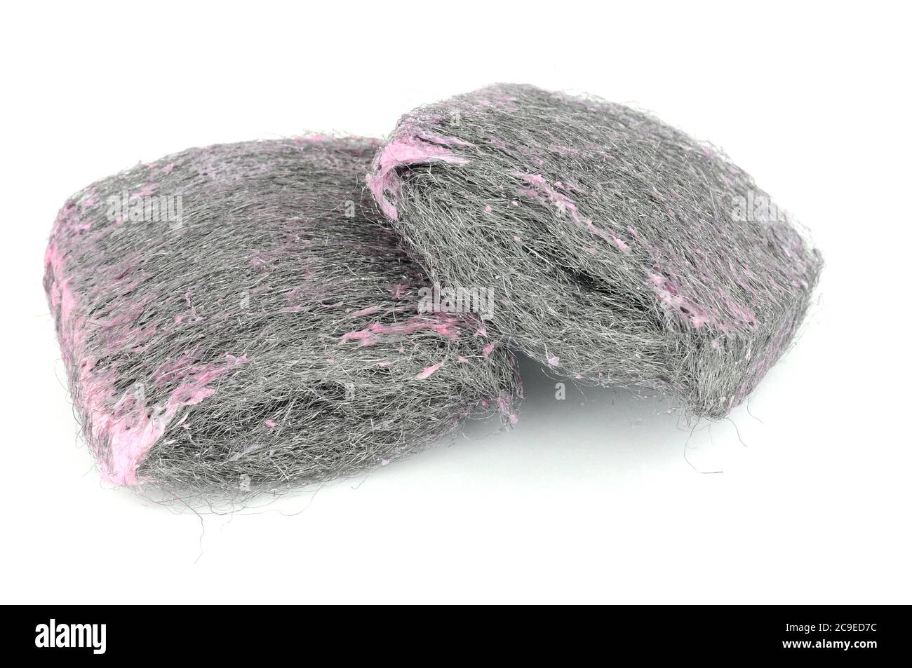 Soap filled wire wool scouring pads isolated on a white background ...