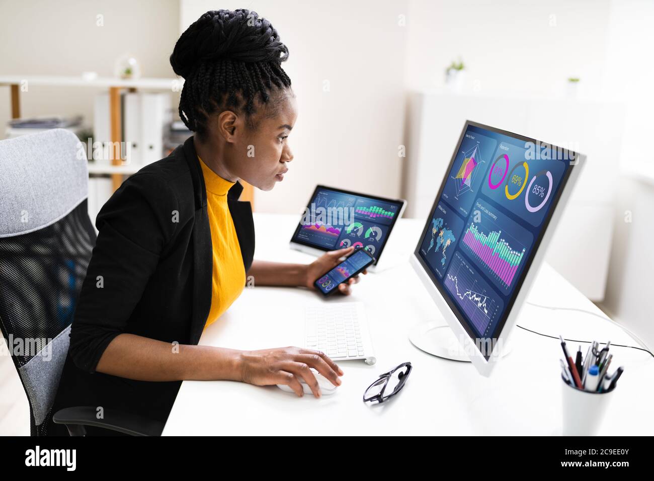 African American Business Data Analyst Woman Using Computer Stock Photo ...