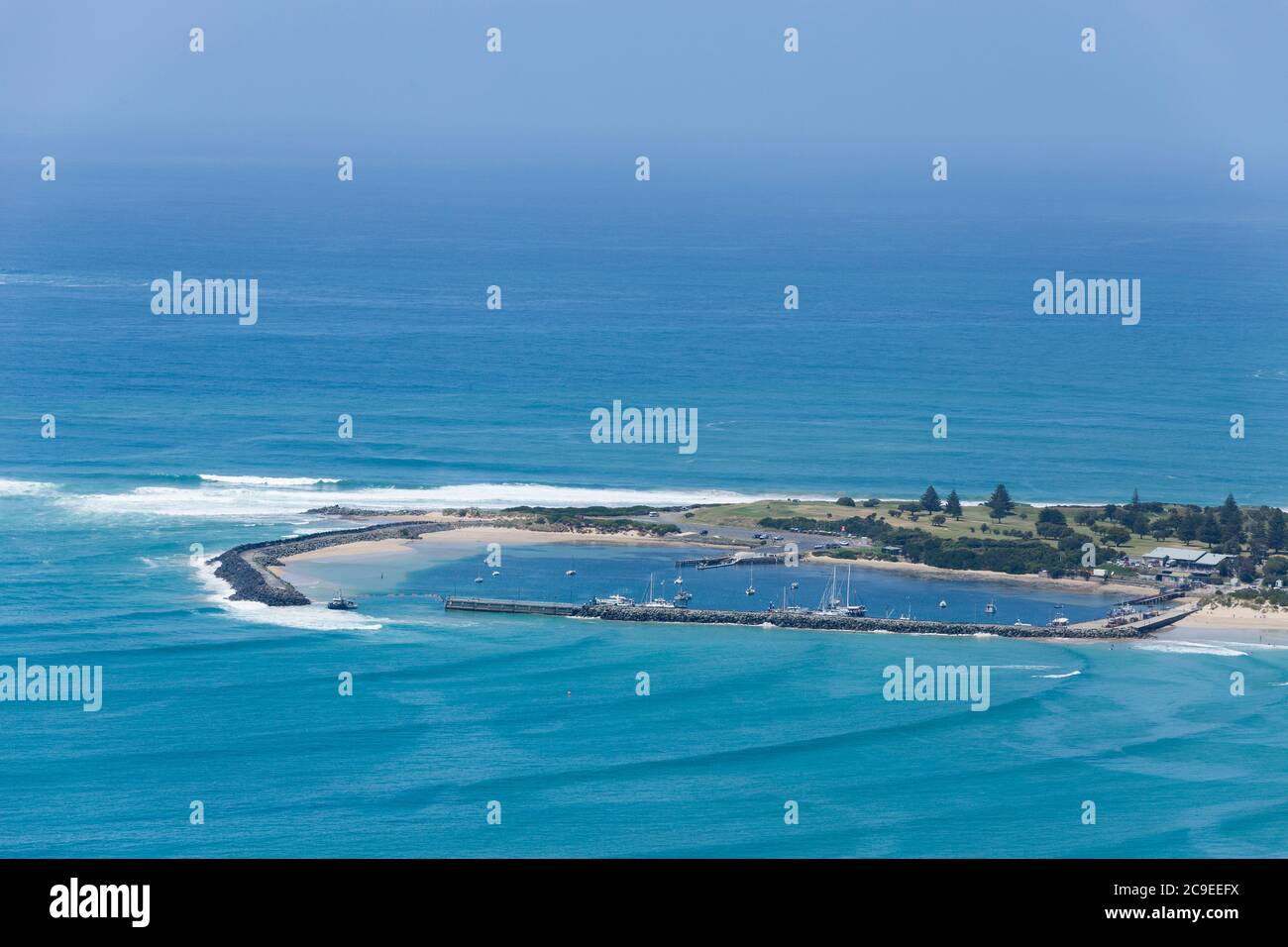 Birds eye view towards the ocean and harbour at Apollo Bay Great Ocean ...