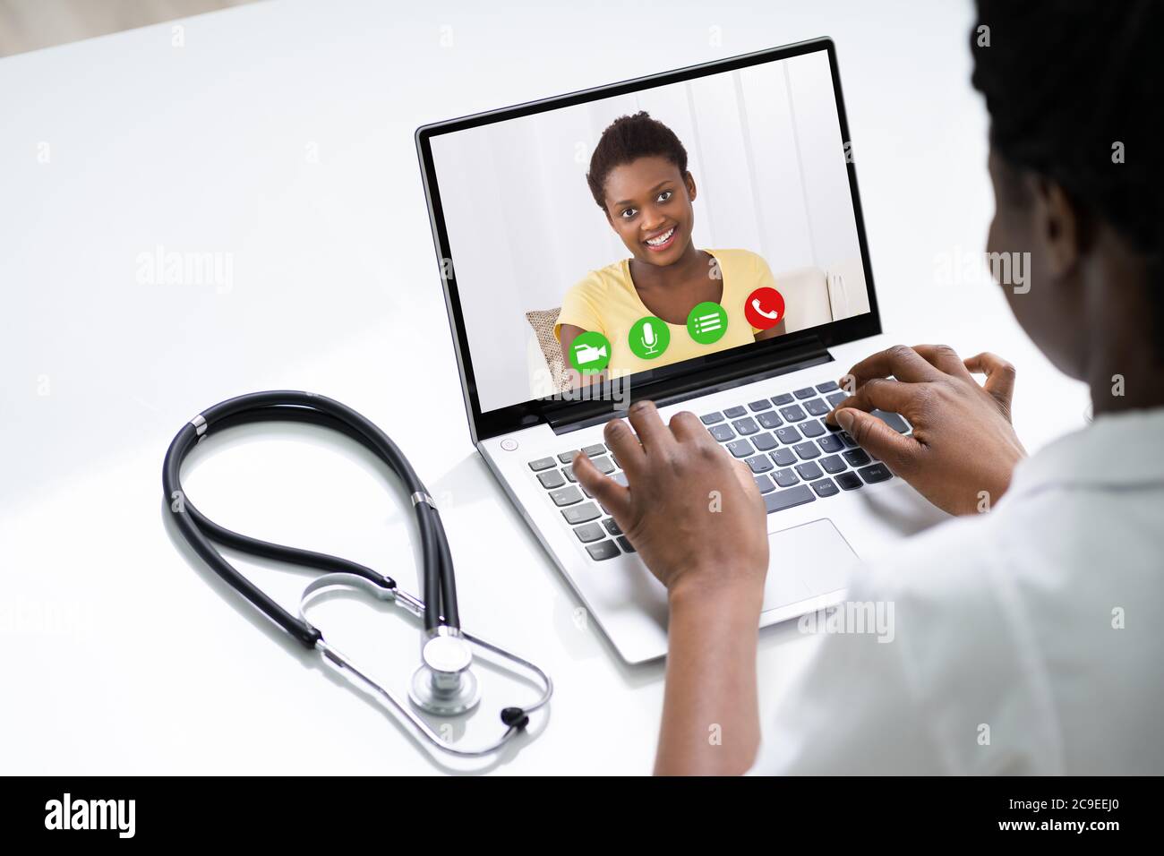 African Doctor In Video Conference Call Talking With Patient Stock ...