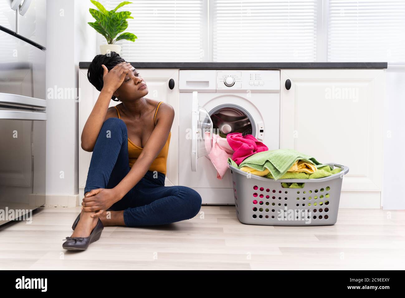 Washing Machine Distressed Sad Frustrated African Woman Stock Photo - Alamy