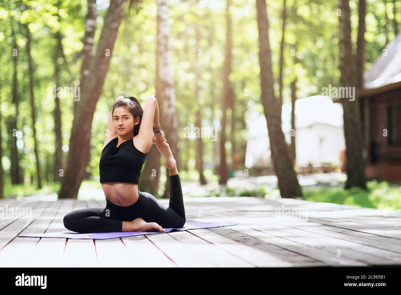 Acrobatic pose hi-res stock photography and images - Alamy