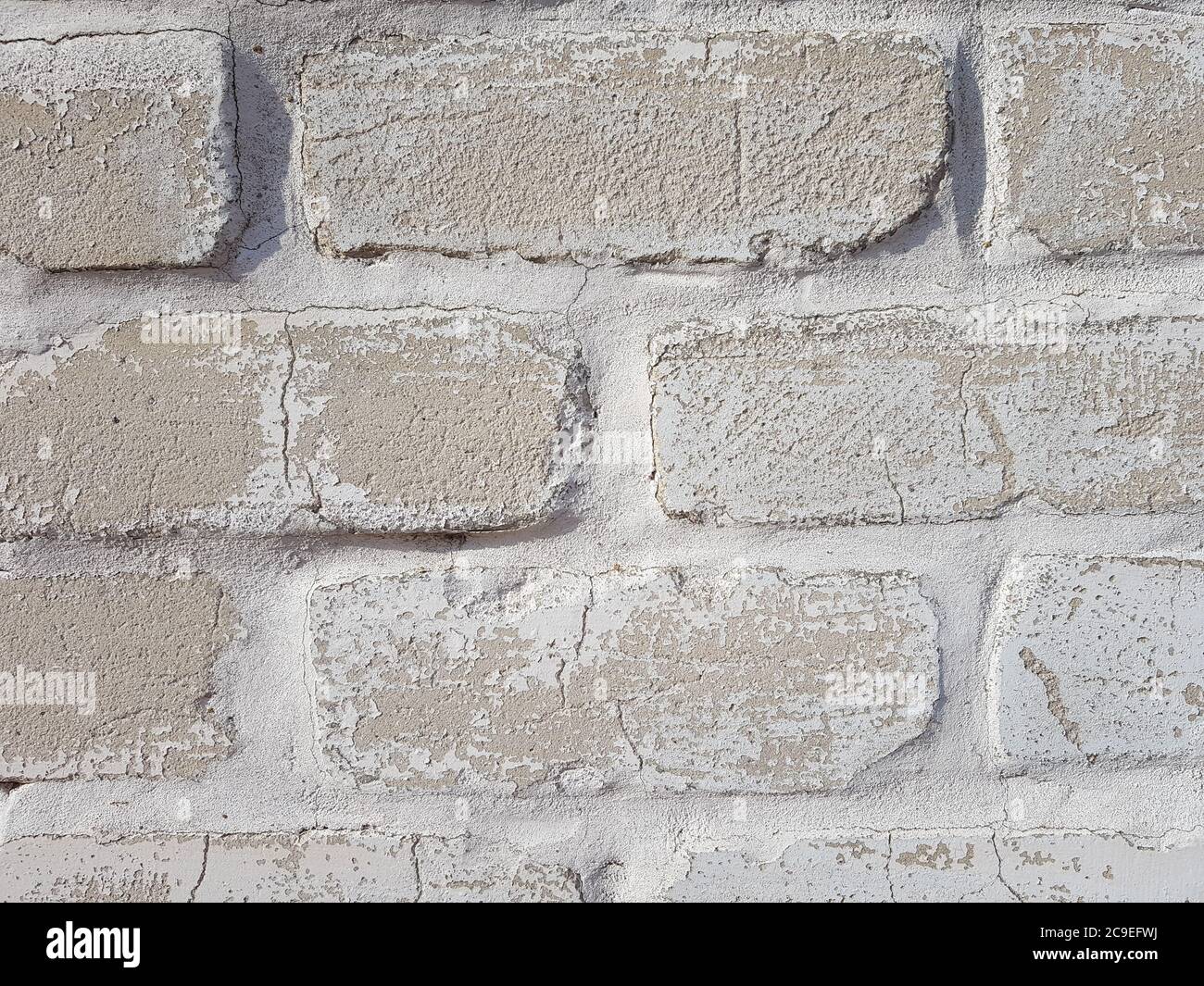 grey brick wall background with sunlight and shadows close up Stock ...