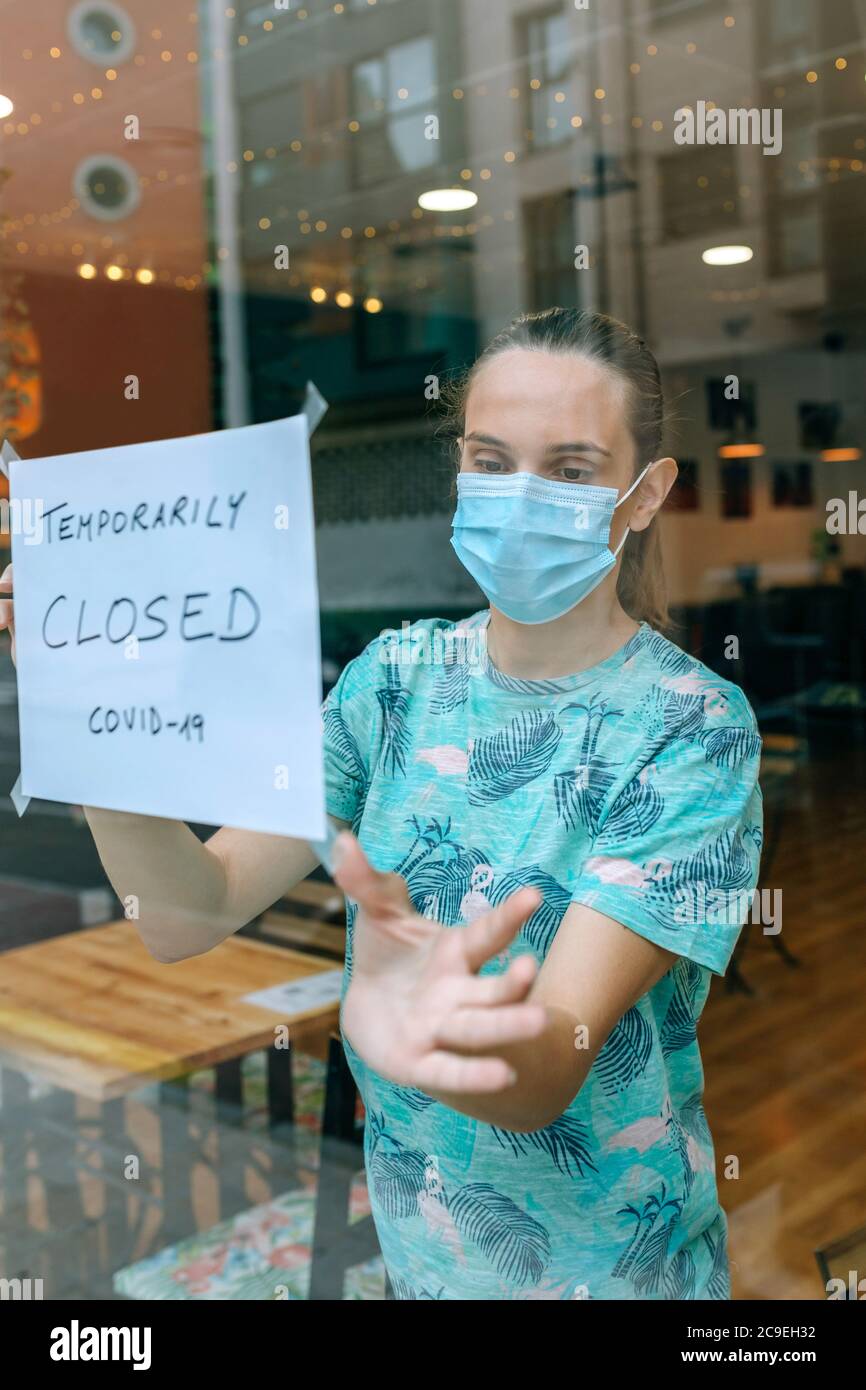 Woman closed sign face hi-res stock photography and images - Alamy