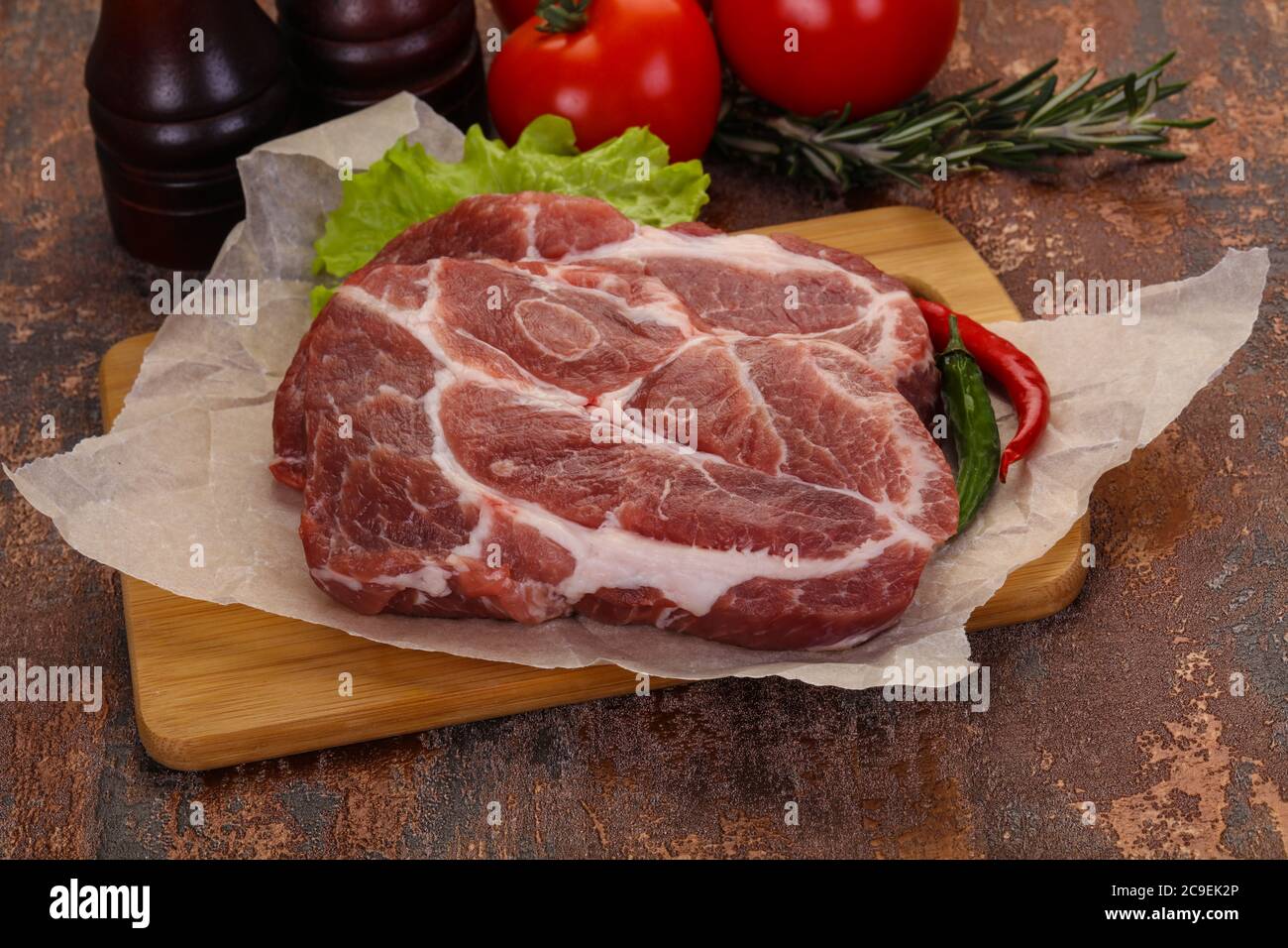 Raw pork neck steak ready for cooking Stock Photo - Alamy