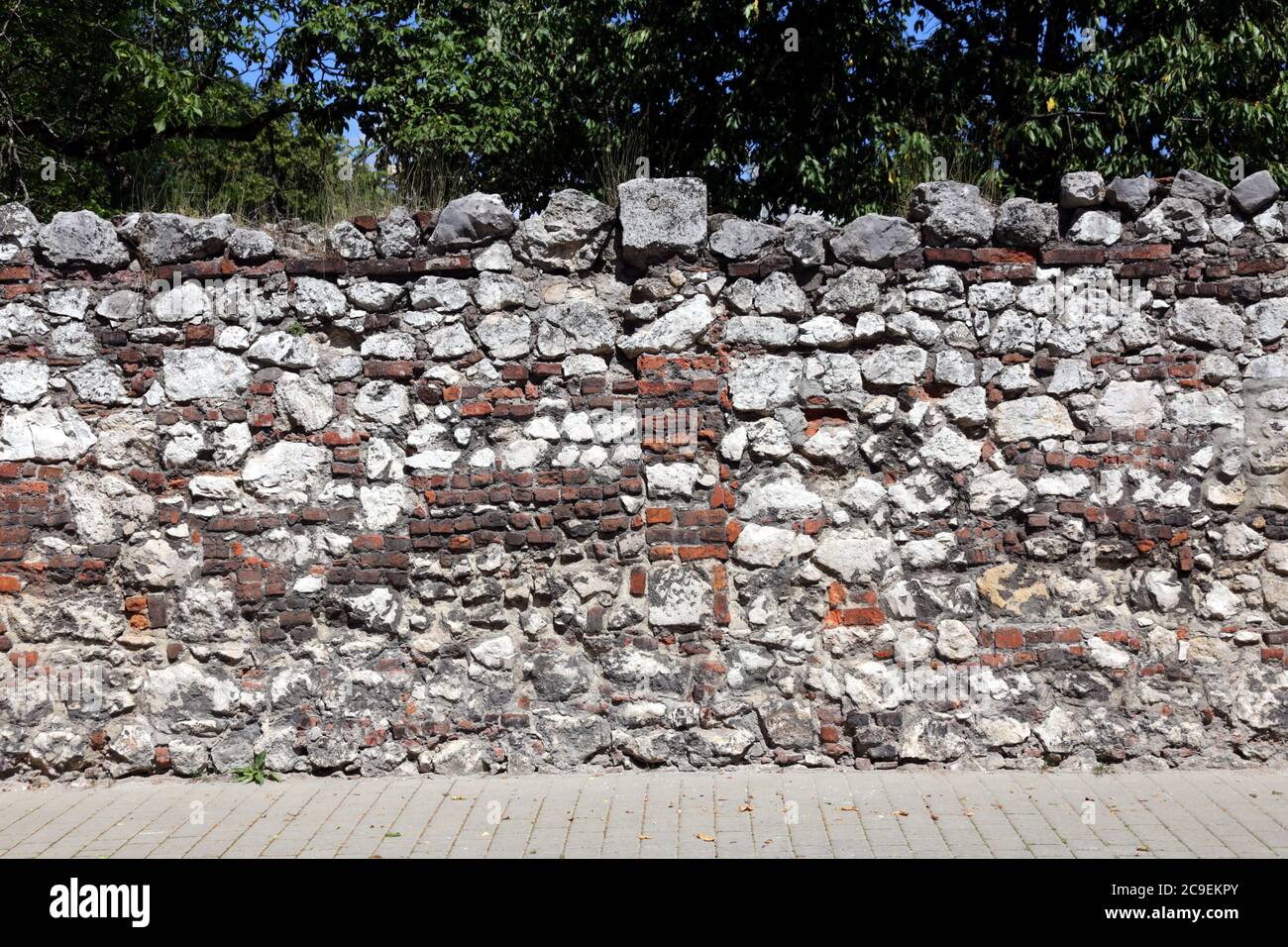 Cracow. Krakow. Poland. Medieval brick and limestone wall Stock Photo ...