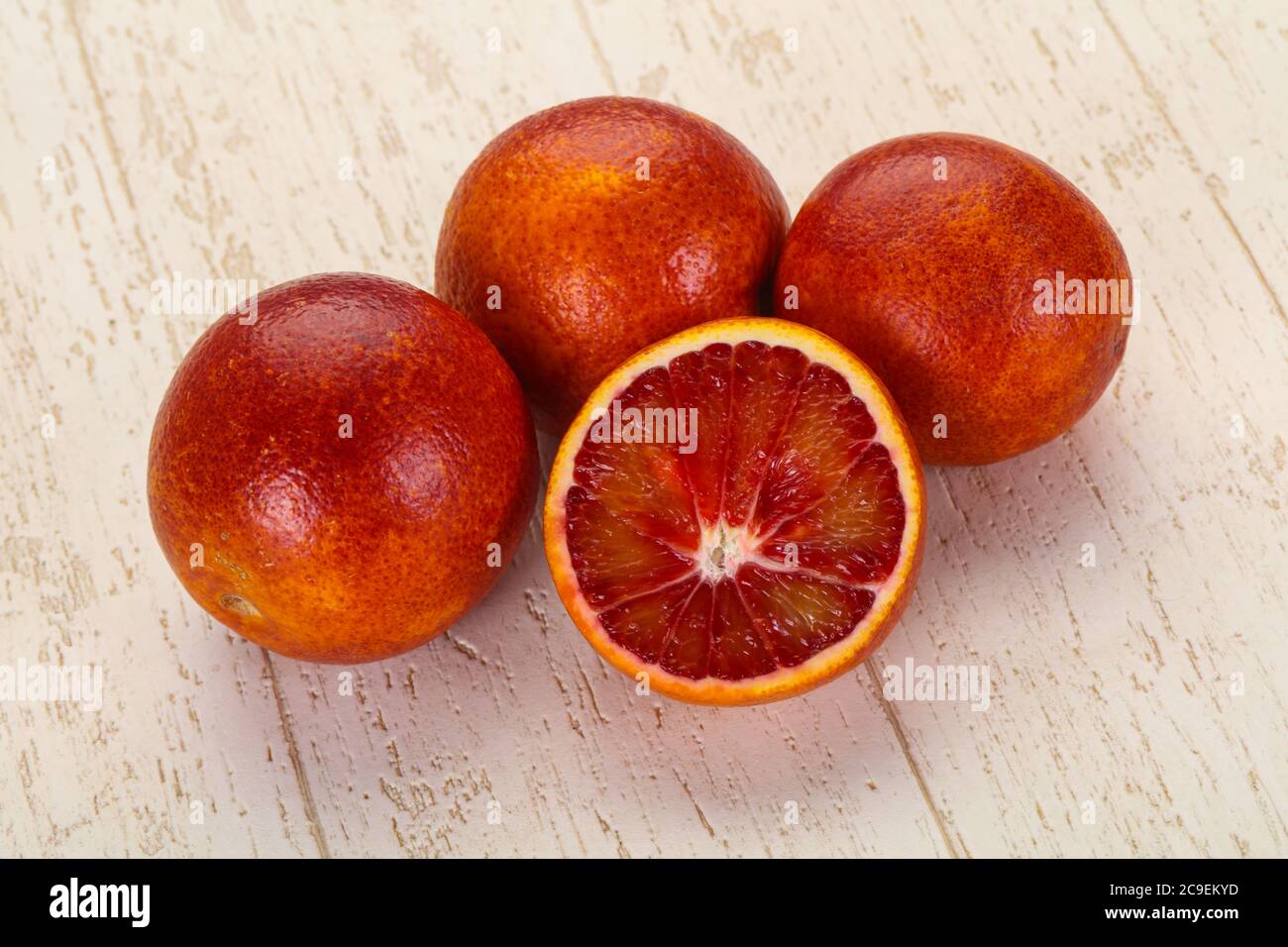 Sweet red orange heap over the table Stock Photo - Alamy