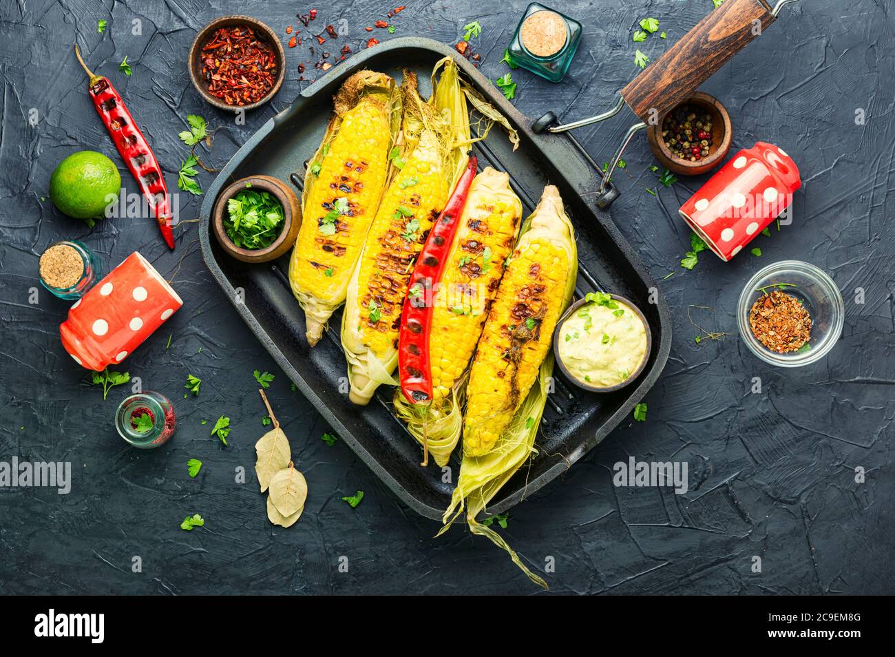 Grilled sweet corn with sauce and spicy.Summer vegan snack Stock Photo ...