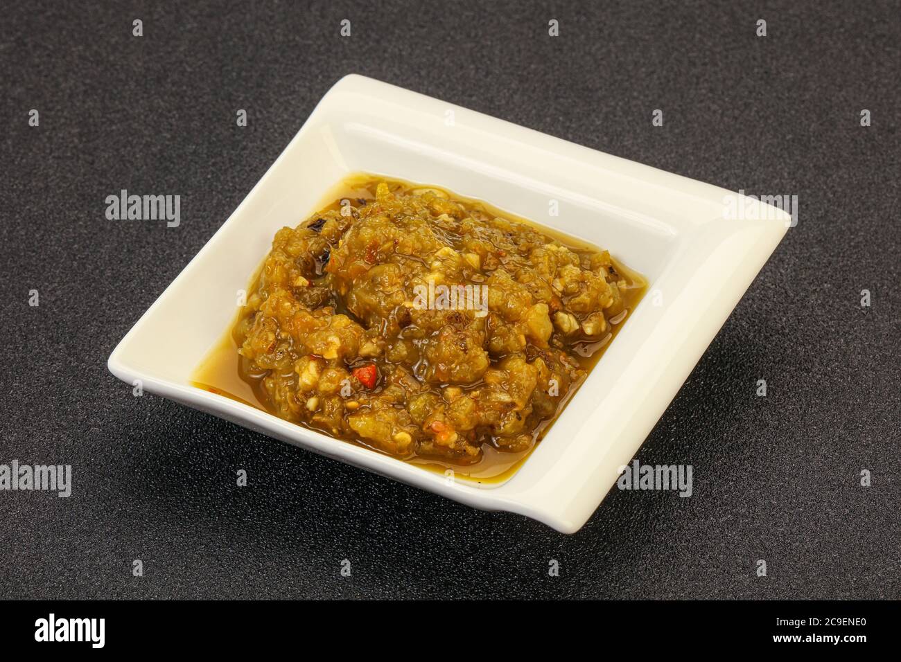 Green spicy sauce with pepper in the bowl Stock Photo - Alamy