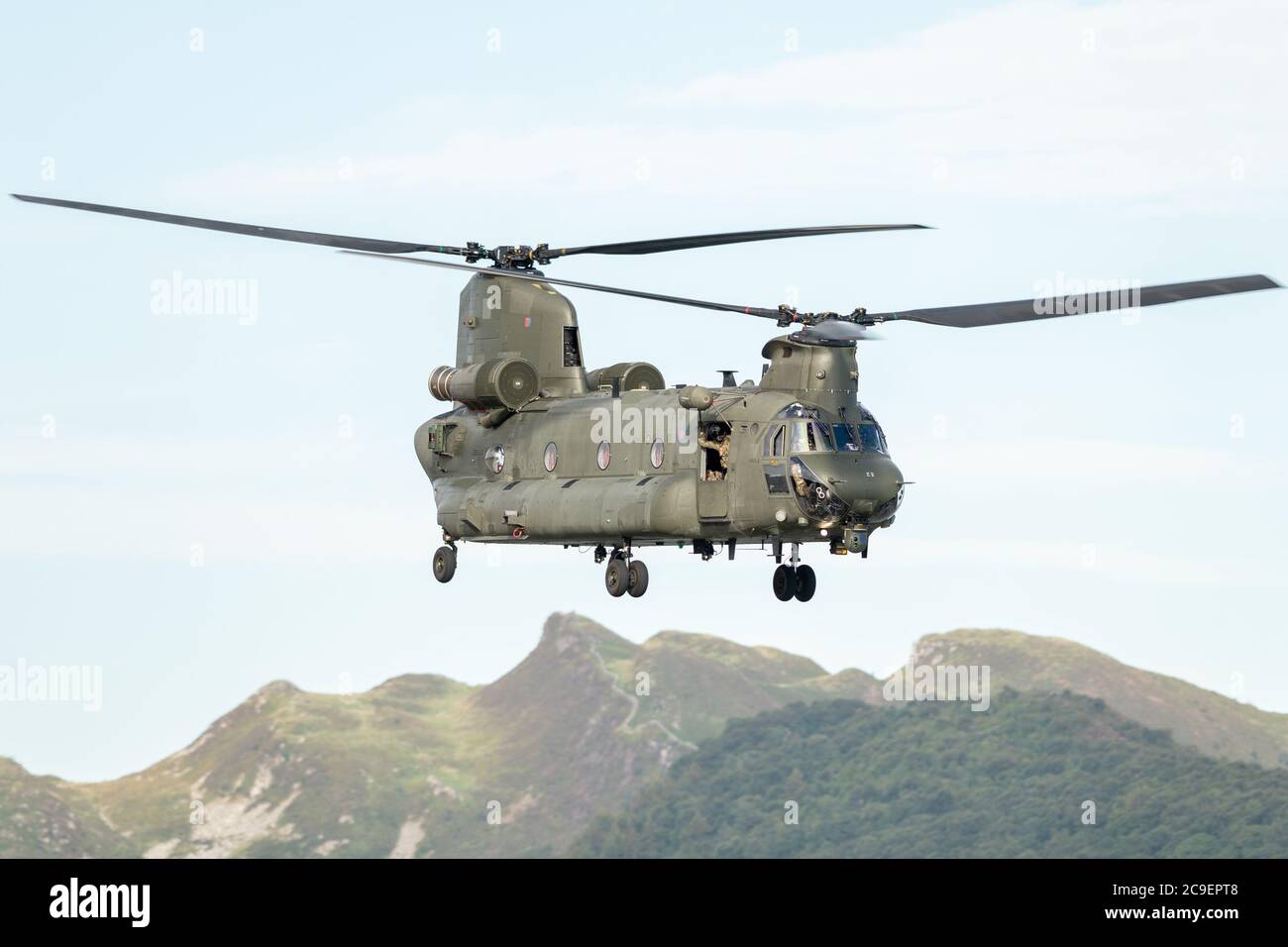 Chinook flying down the Mawddach estuary Stock Photo - Alamy