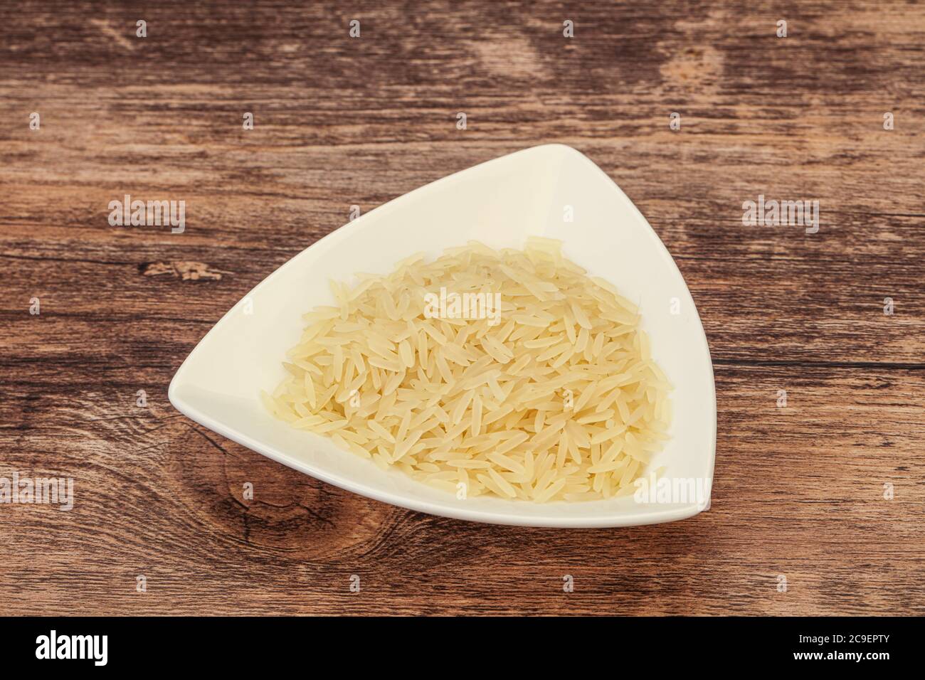 Raw Indian basmati rice in the bowl Stock Photo - Alamy