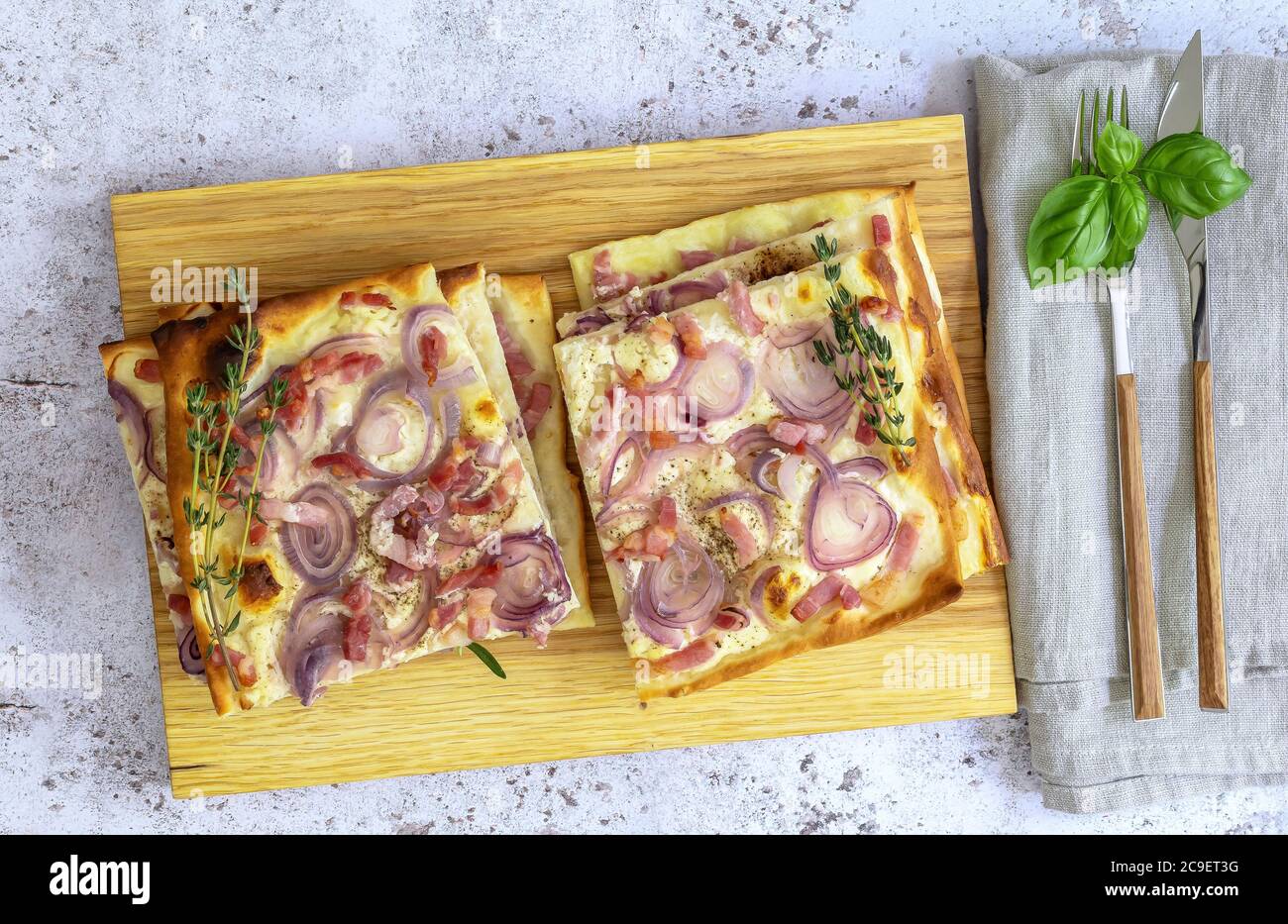 Traditional sliced german pizza or flammkuchen Stock Photo - Alamy