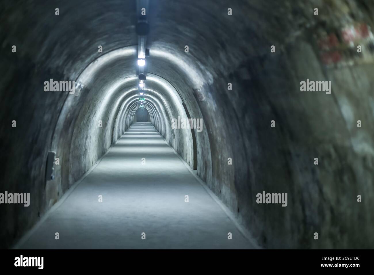 Old concrete tunnel with fluorescent lights Stock Photo - Alamy