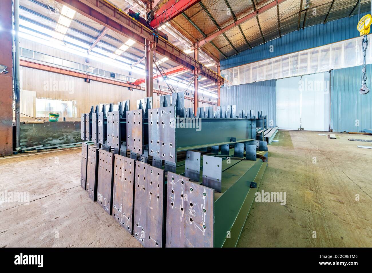 Steel factory floor, stacked with a lot of steel Stock Photo - Alamy