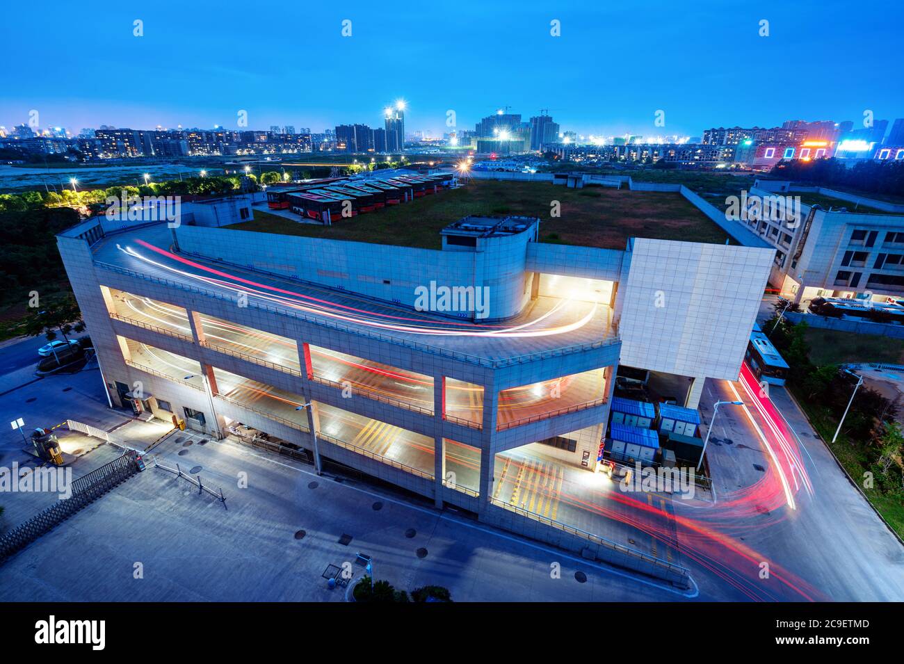 Night view of a three-dimensional parking lot, Beijing, China Stock ...