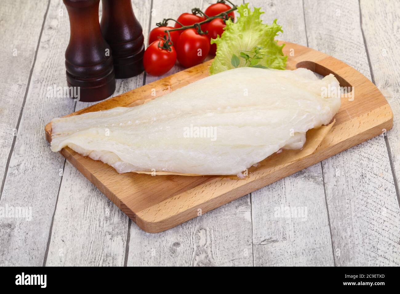 Raw halibut fillet ready for cooking Stock Photo - Alamy