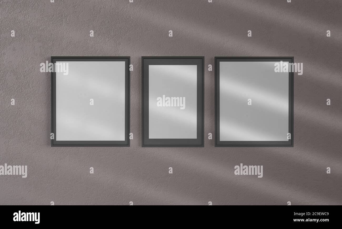 Three frames on a wall mockup 3d rendering Stock Photo - Alamy