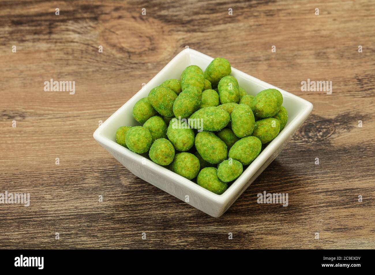 Spicy wasabi peanuts snack in the bowl Stock Photo - Alamy