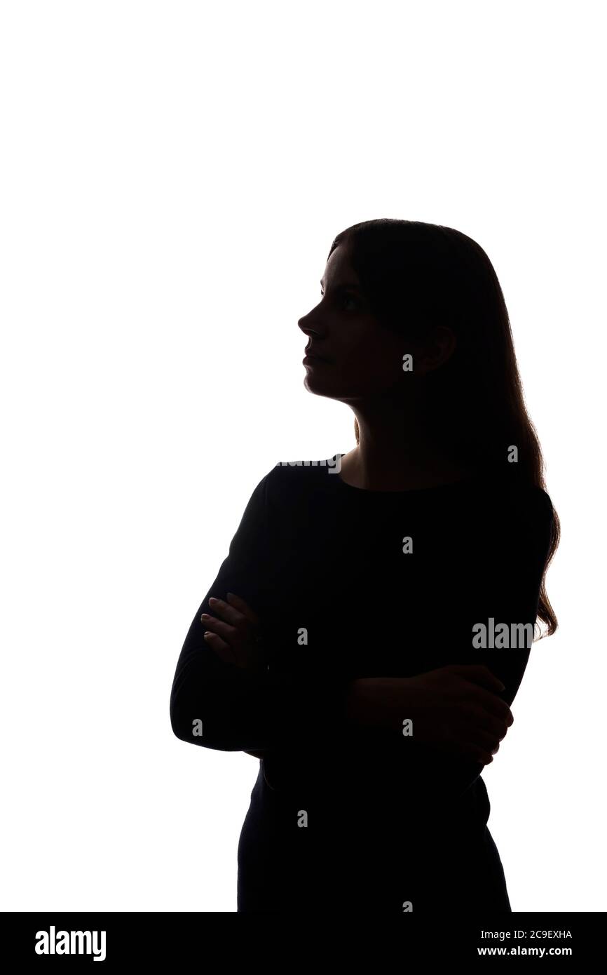Portrait of a beautiful young girl looking up concept and symbol of ...