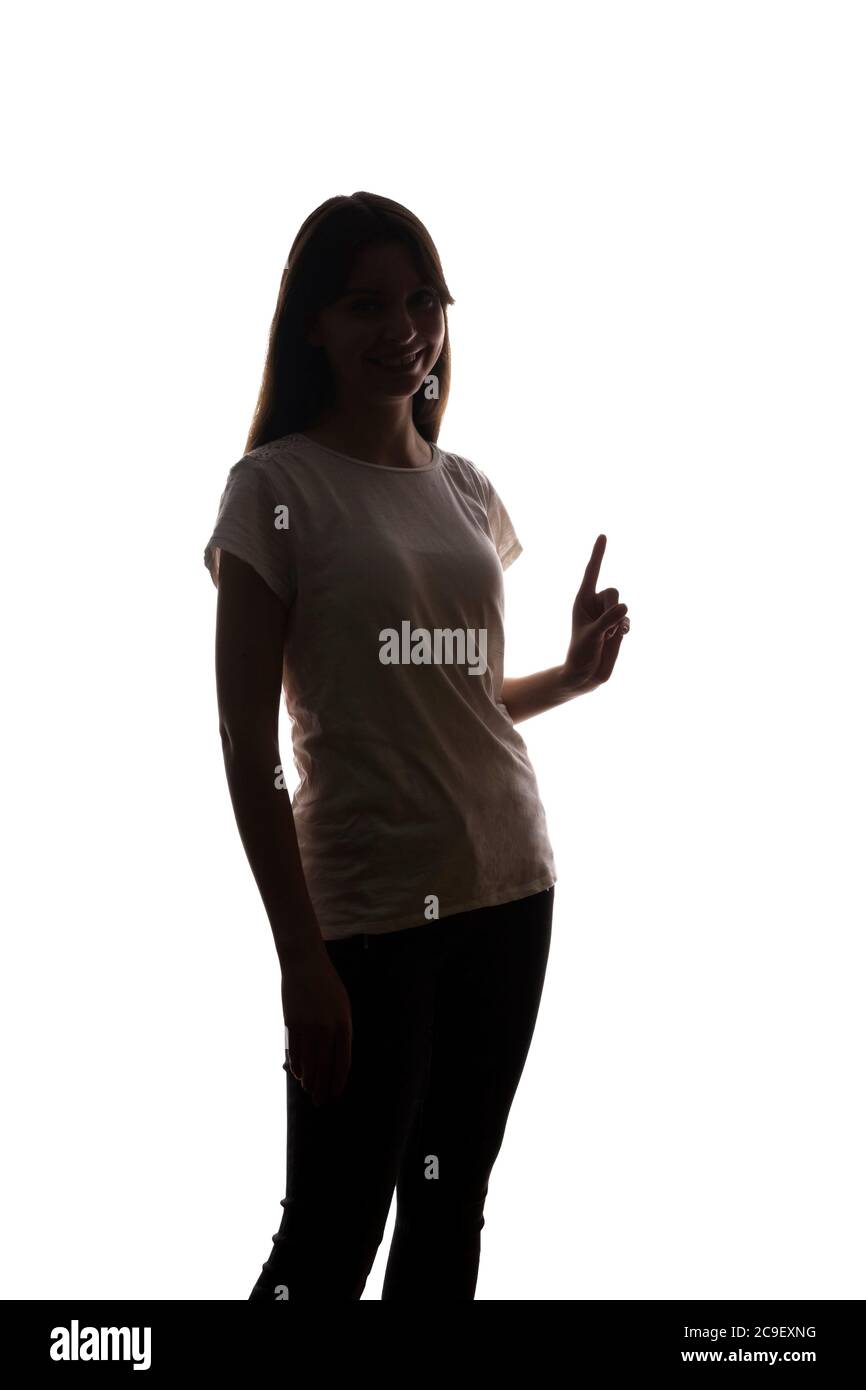 Young woman shows his index finger, hand forward - silhouette Stock ...