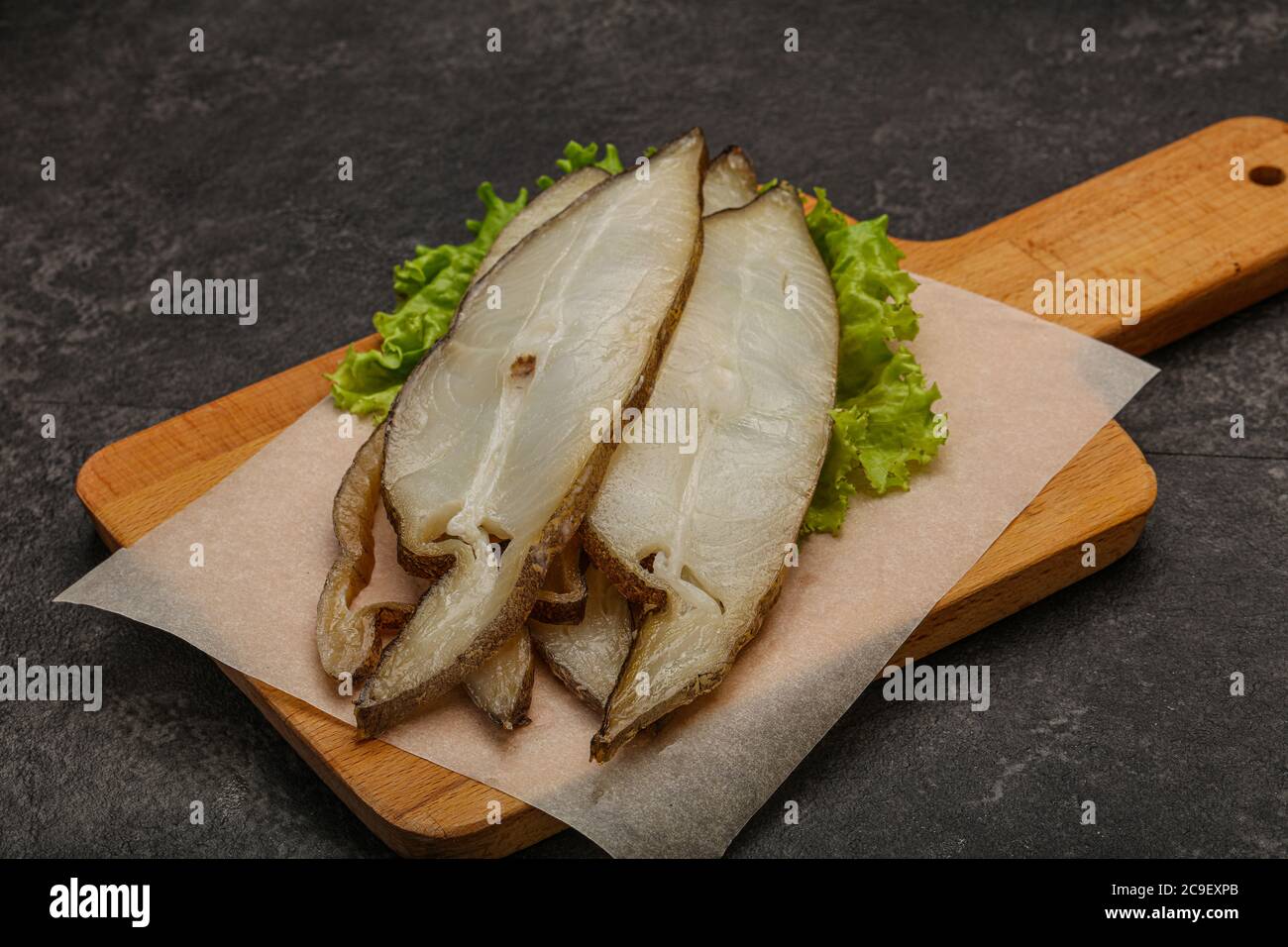 Delicous smoked halibut fish slices snack Stock Photo - Alamy