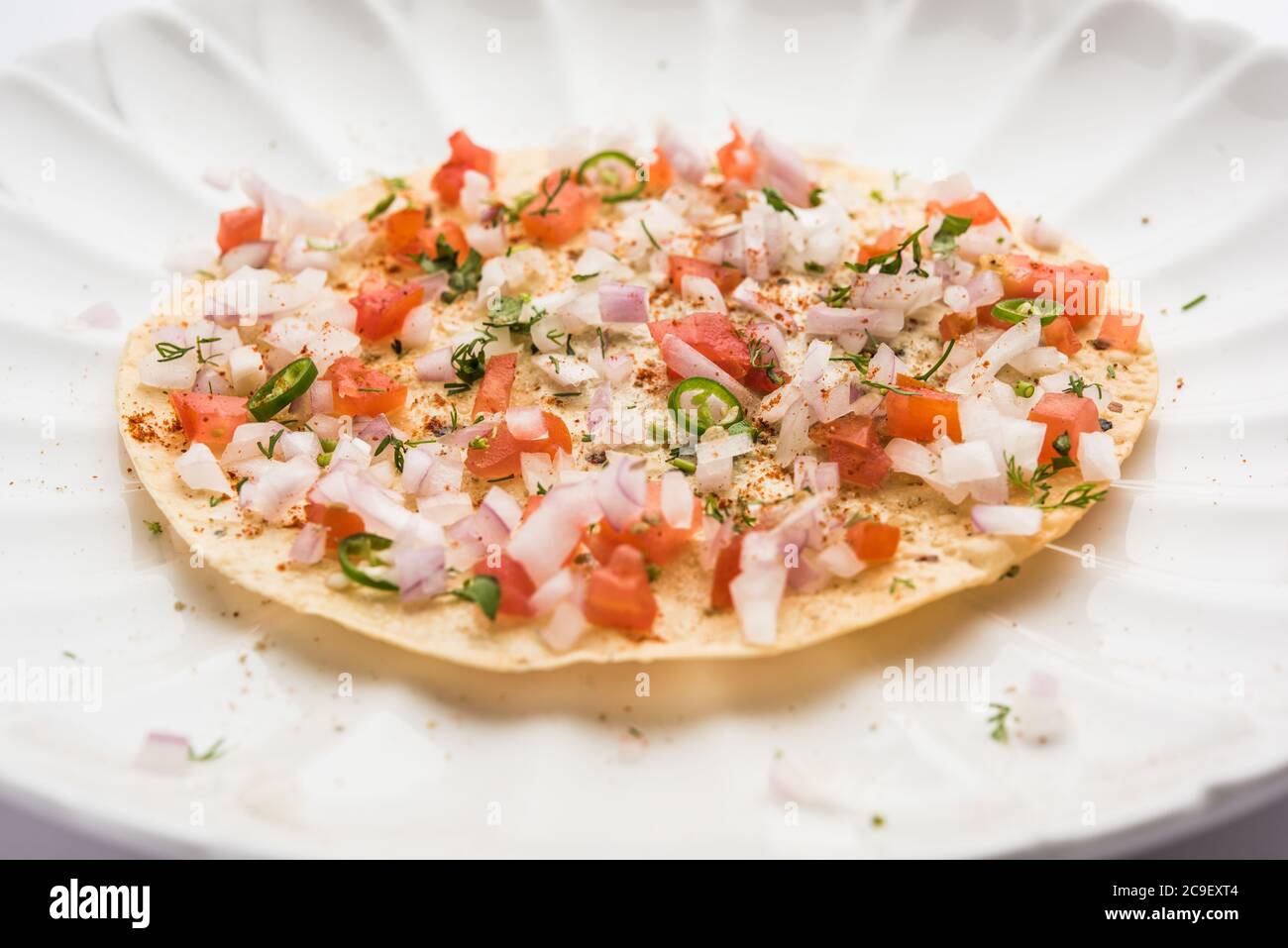 Masala Papad or papadum is a delicious Indian snack made using roasted ...