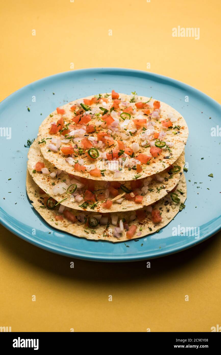 Masala Papad or papadum is a delicious Indian snack made using roasted ...