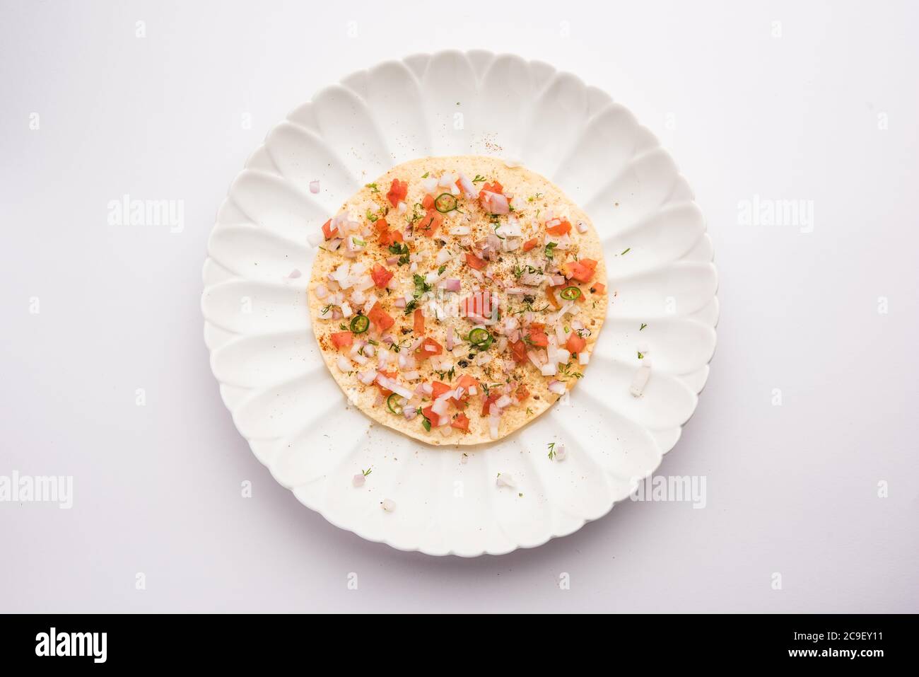 Masala Papad or papadum is a delicious Indian snack made using roasted ...