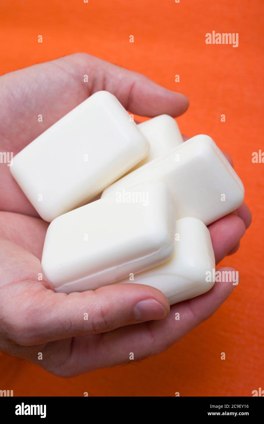 Hands with a pile of soap panic purchase - protection against influenza ...