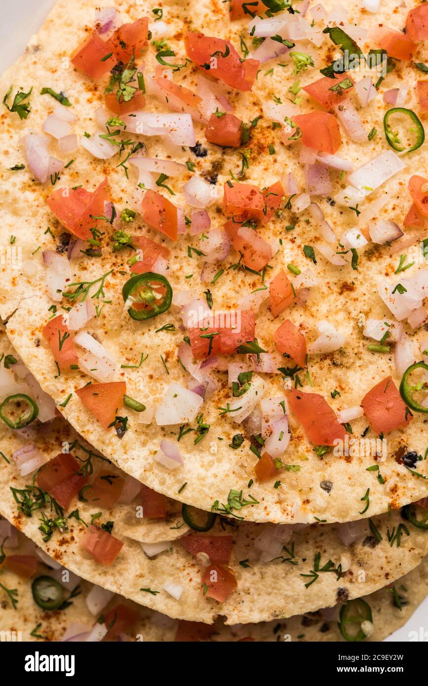 Masala Papad or papadum is a delicious Indian snack made using roasted ...