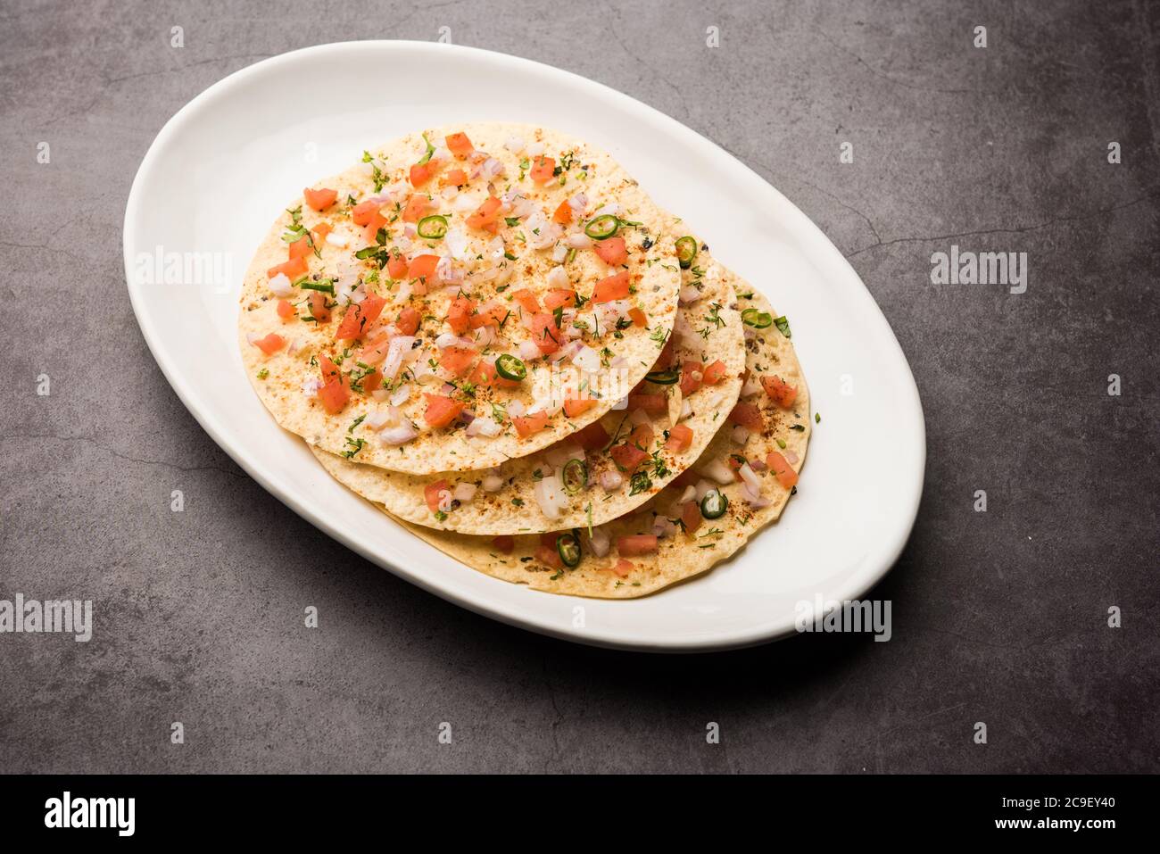 Masala Papad or papadum is a delicious Indian snack made using roasted ...