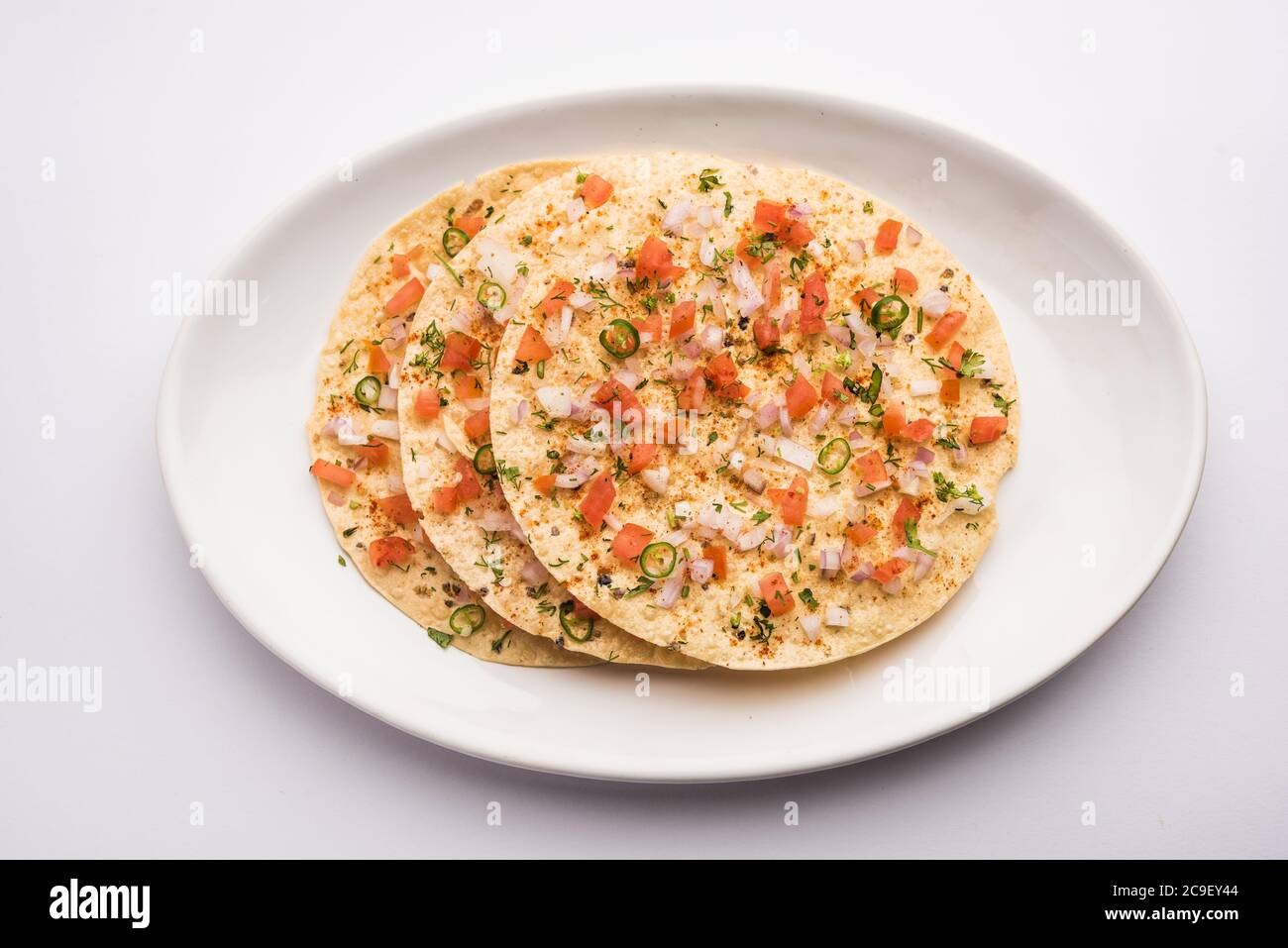 Masala Papad or papadum is a delicious Indian snack made using roasted ...