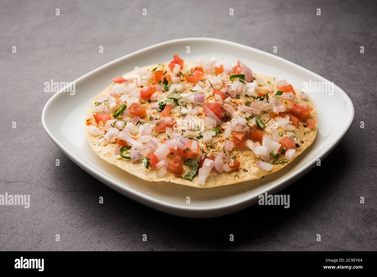 Masala Papad or papadum is a delicious Indian snack made using roasted ...