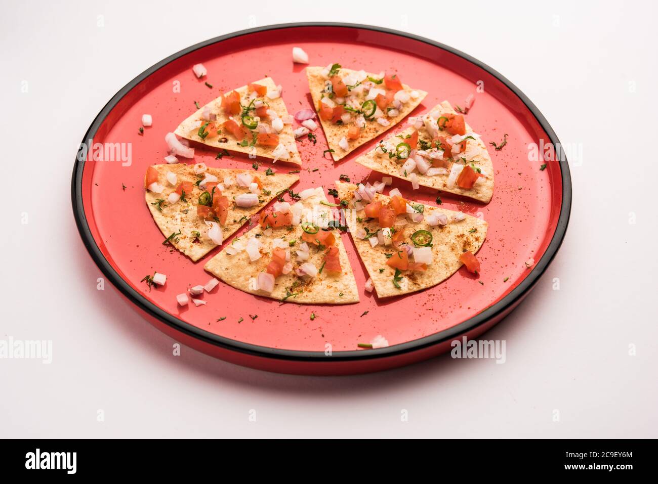 Masala Papad or papadum is a delicious Indian snack made using roasted ...