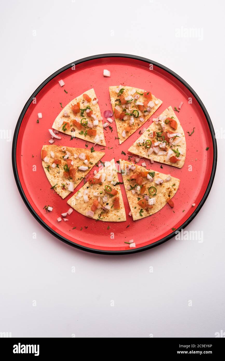 Masala Papad or papadum is a delicious Indian snack made using roasted ...