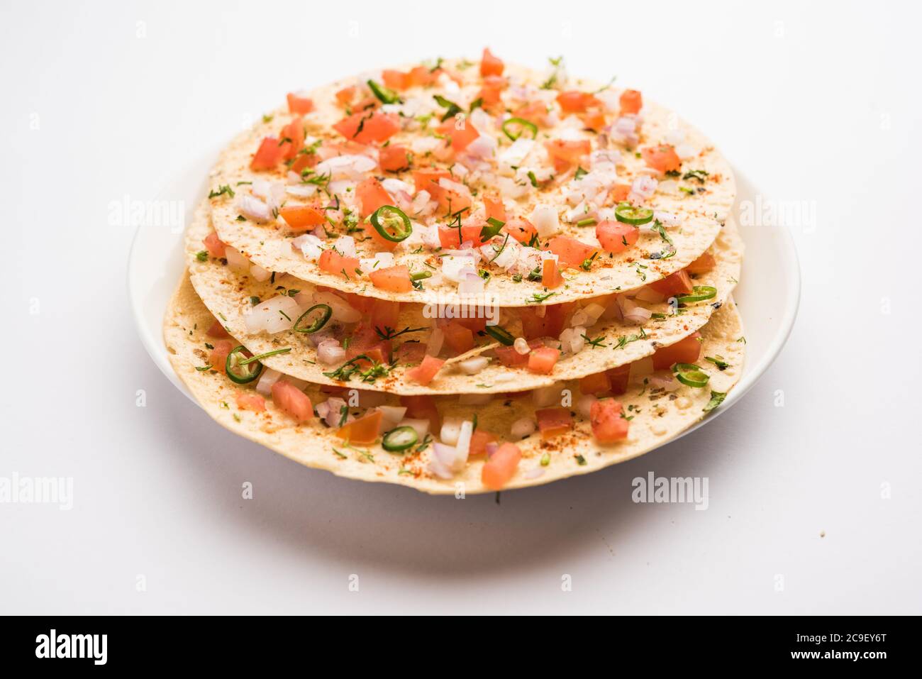 Masala Papad or papadum is a delicious Indian snack made using roasted ...