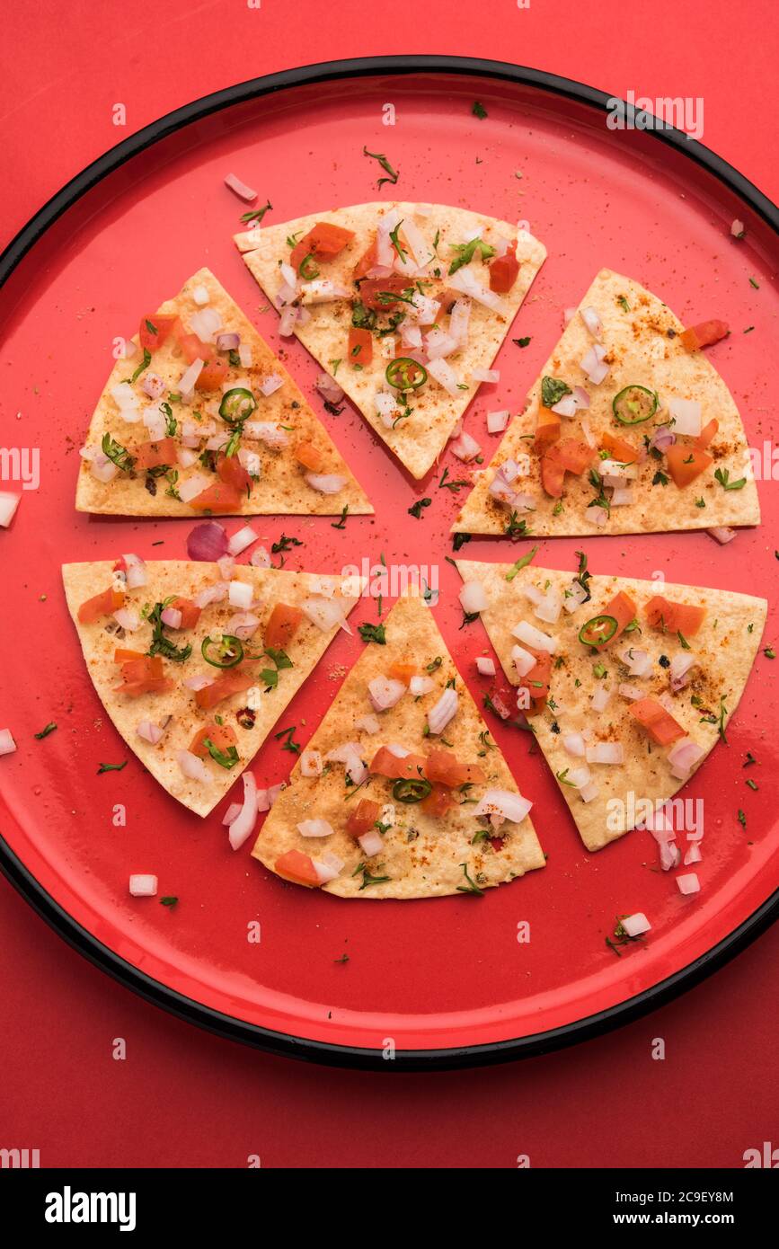 Masala Papad or papadum is a delicious Indian snack made using roasted ...