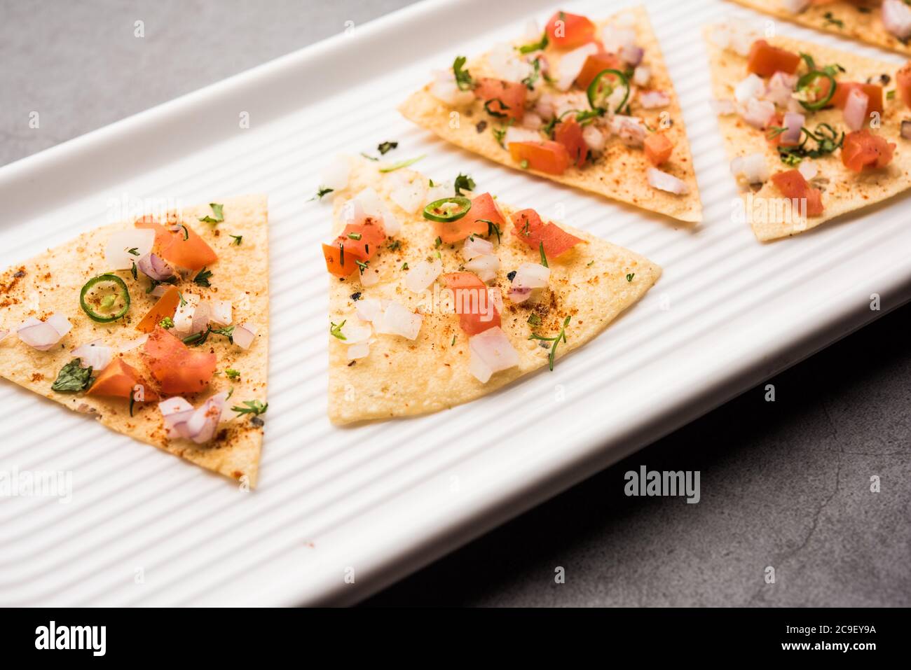 Masala Papad or papadum is a delicious Indian snack made using roasted ...