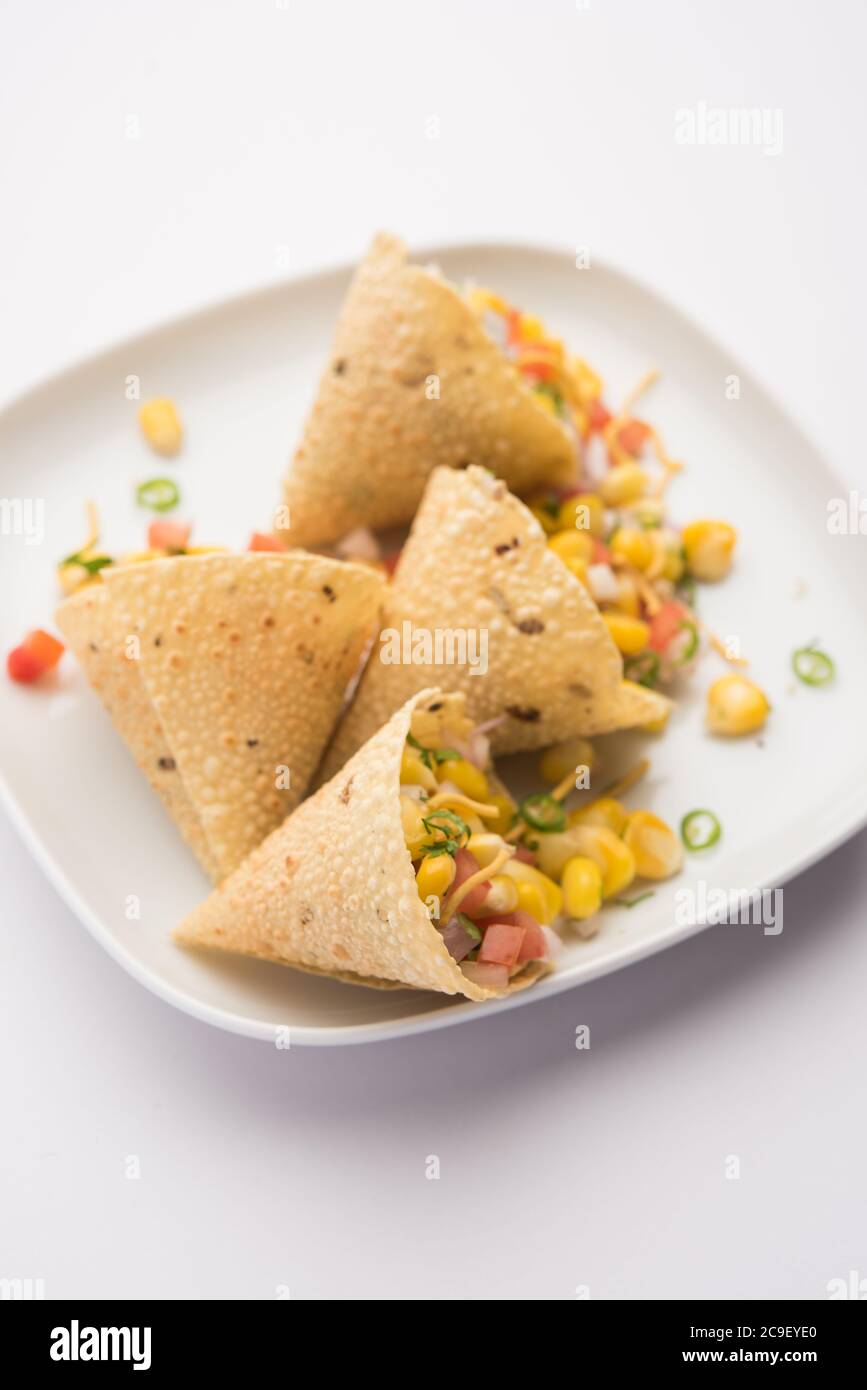 Corn chat / chaat in papad cone, popular indian starter menu Stock ...