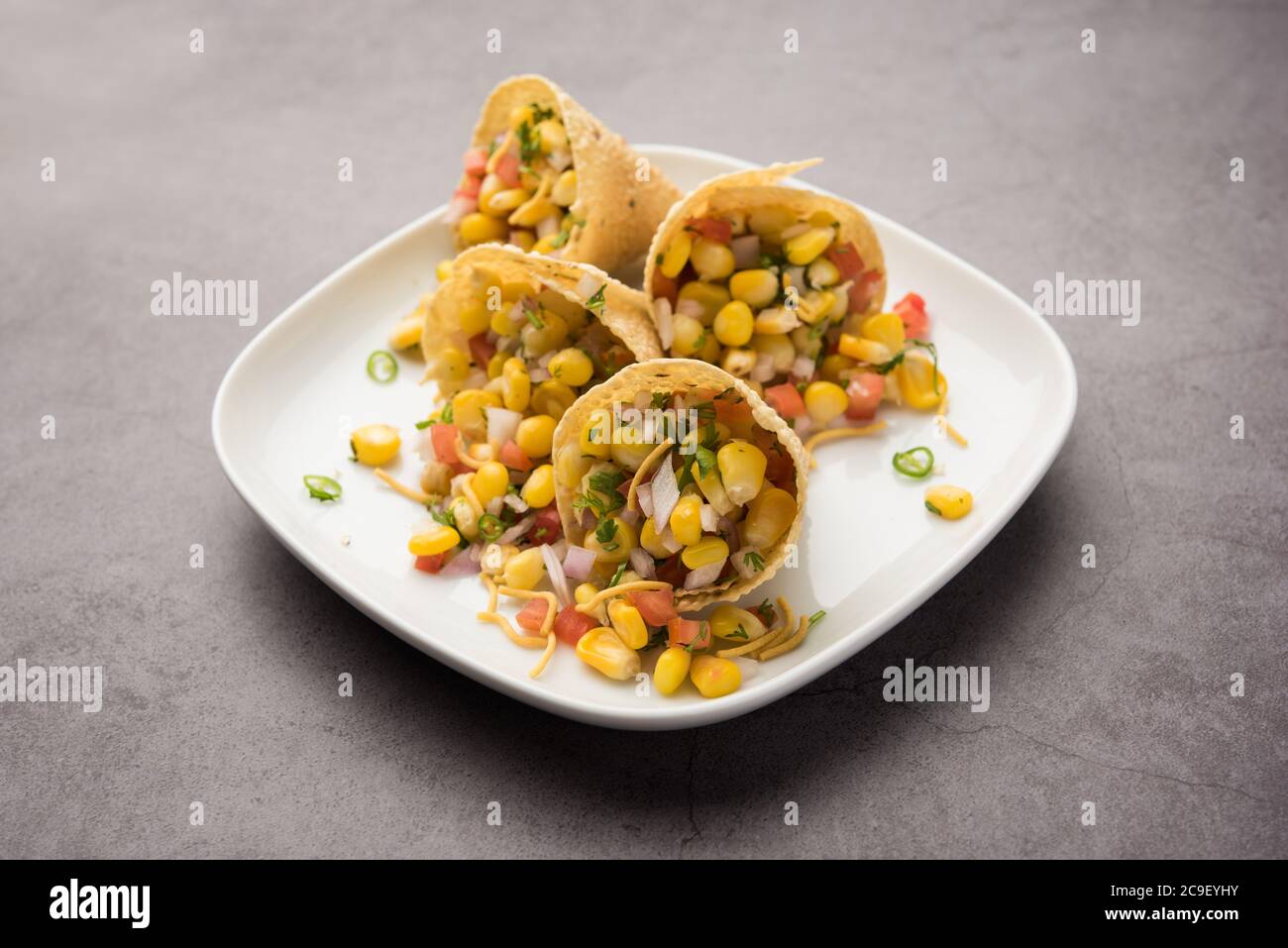 Corn chat / chaat in papad cone, popular indian starter menu Stock ...