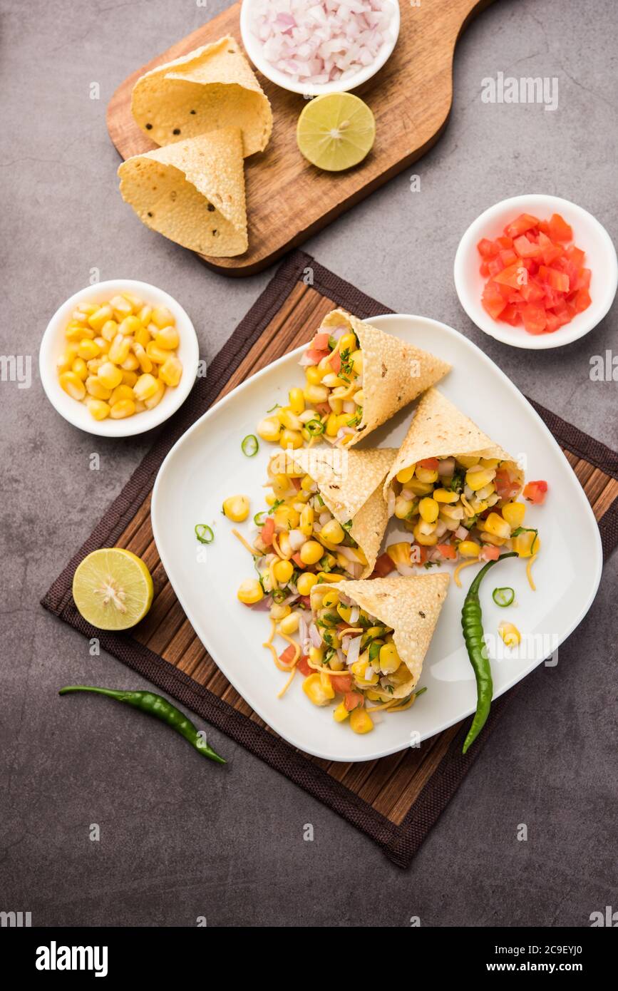 Corn chat / chaat in papad cone, popular indian starter menu Stock ...