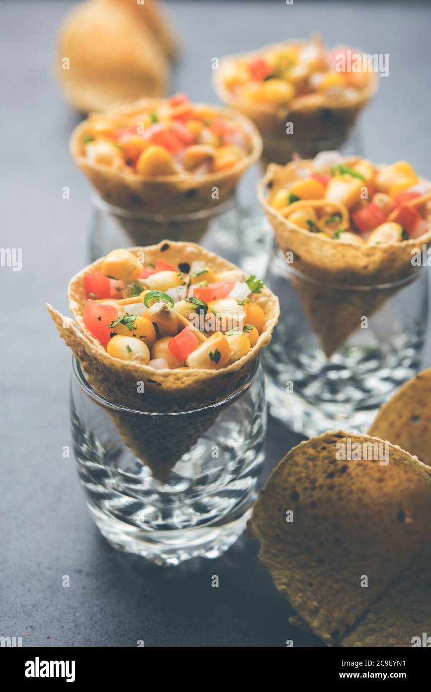 Corn chat / chaat in papad cone, popular indian starter menu Stock ...