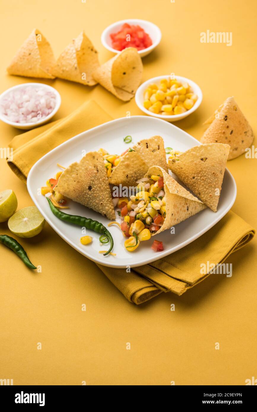 Corn chat / chaat in papad cone, popular indian starter menu Stock ...