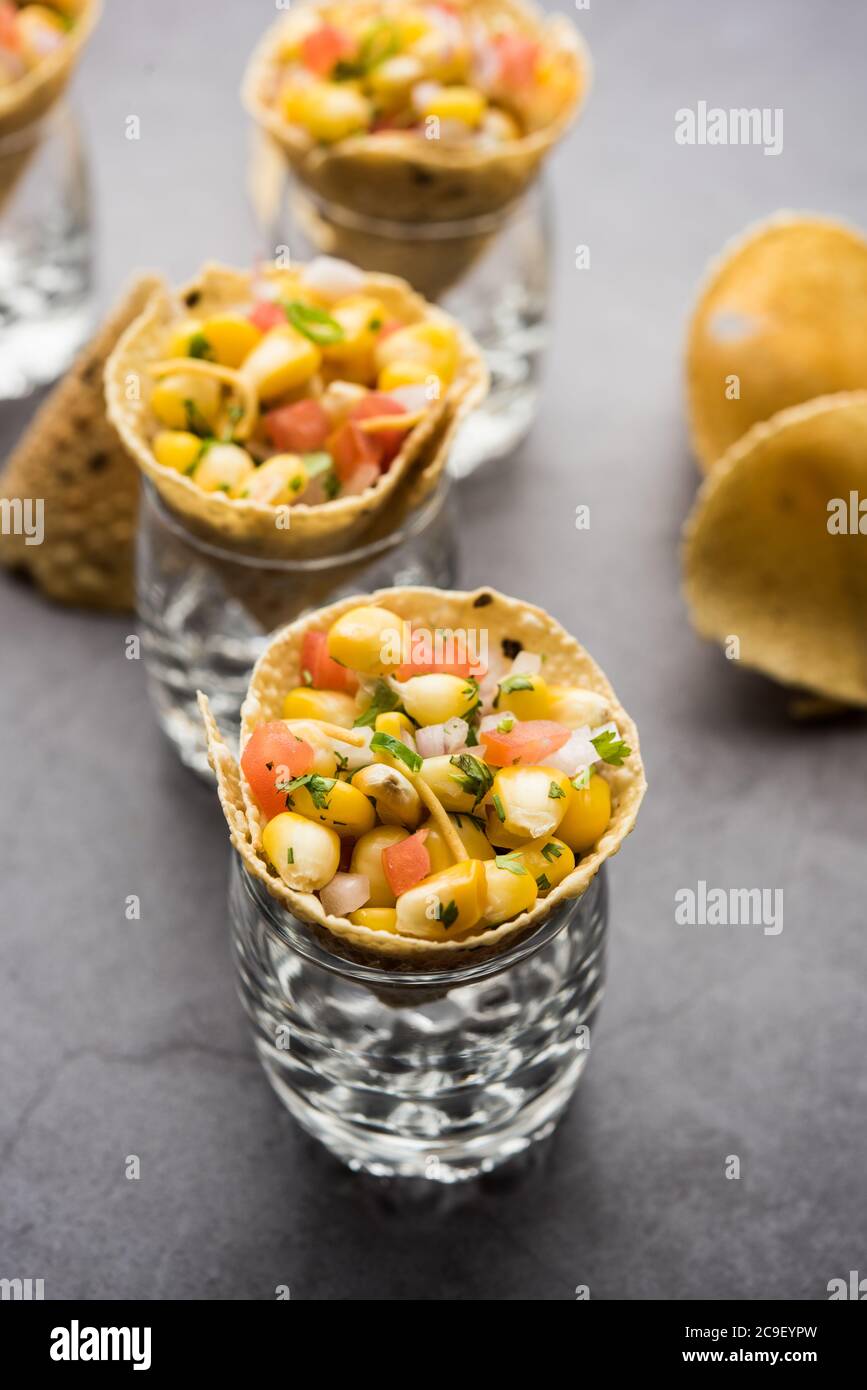 Corn chat / chaat in papad cone, popular indian starter menu Stock ...