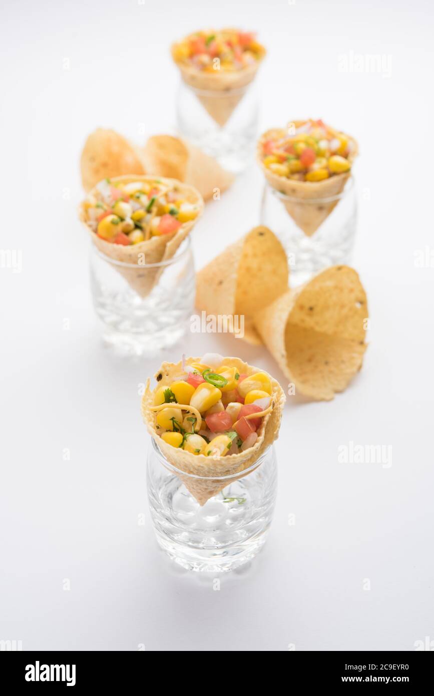 Corn chat / chaat in papad cone, popular indian starter menu Stock ...
