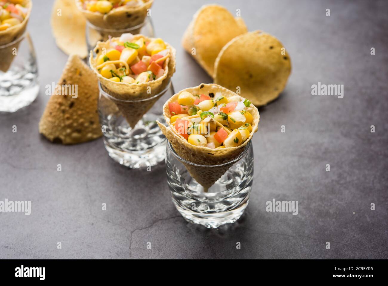 Corn chat / chaat in papad cone, popular indian starter menu Stock ...