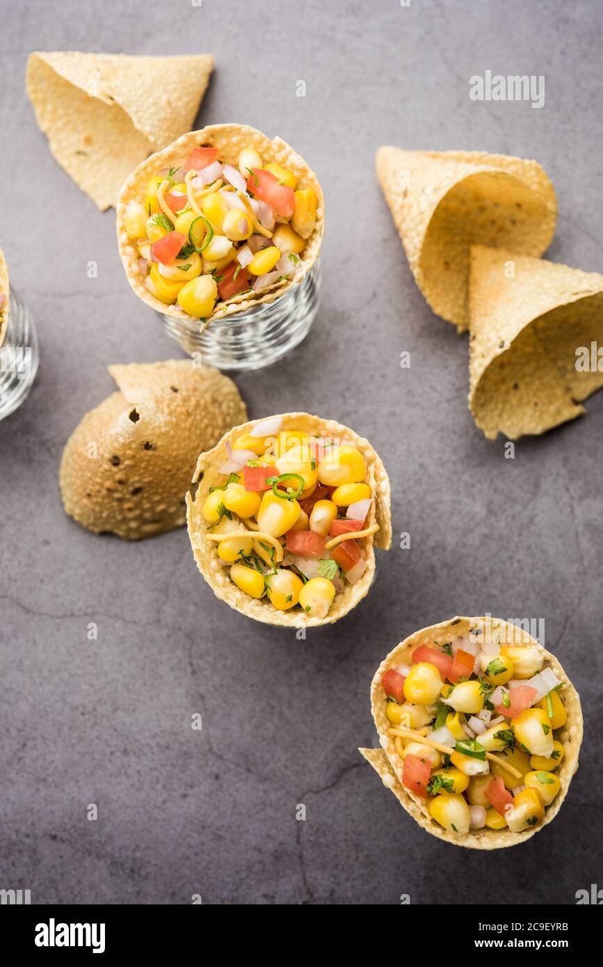 Corn chat / chaat in papad cone, popular indian starter menu Stock ...