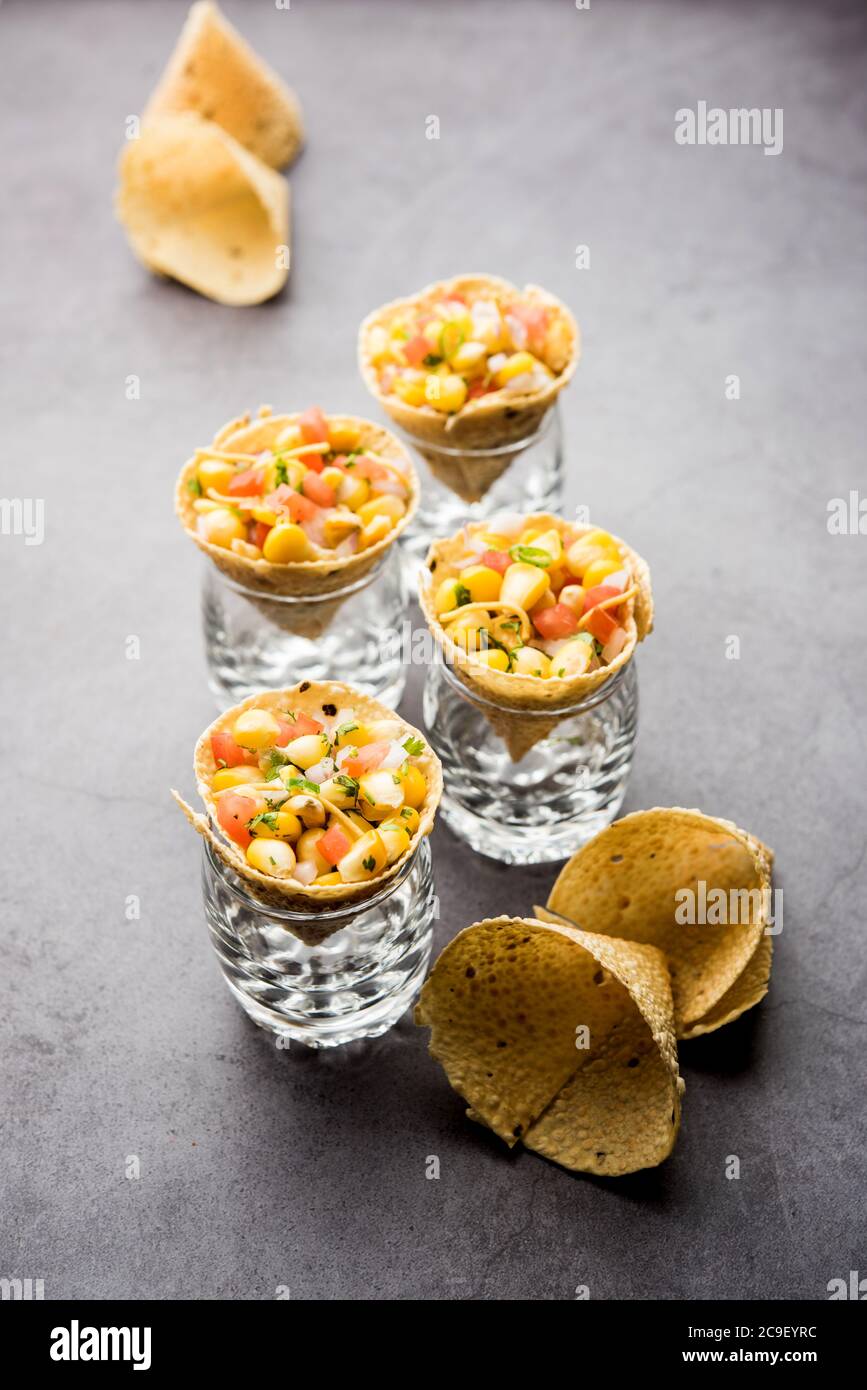 Corn chat / chaat in papad cone, popular indian starter menu Stock ...