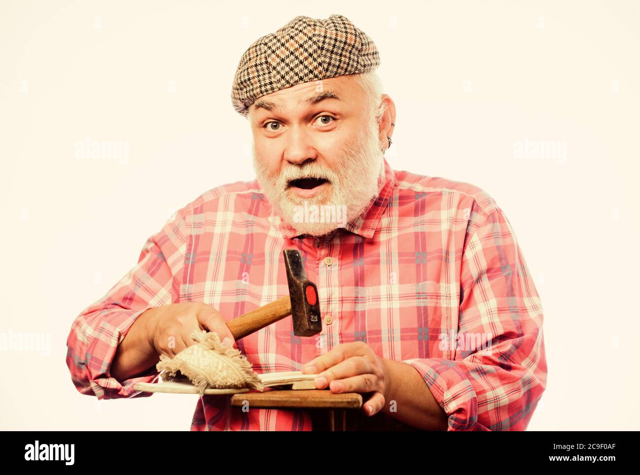 Shoe repair. mature shoemaker in workshop make shoes. shoemaker working ...