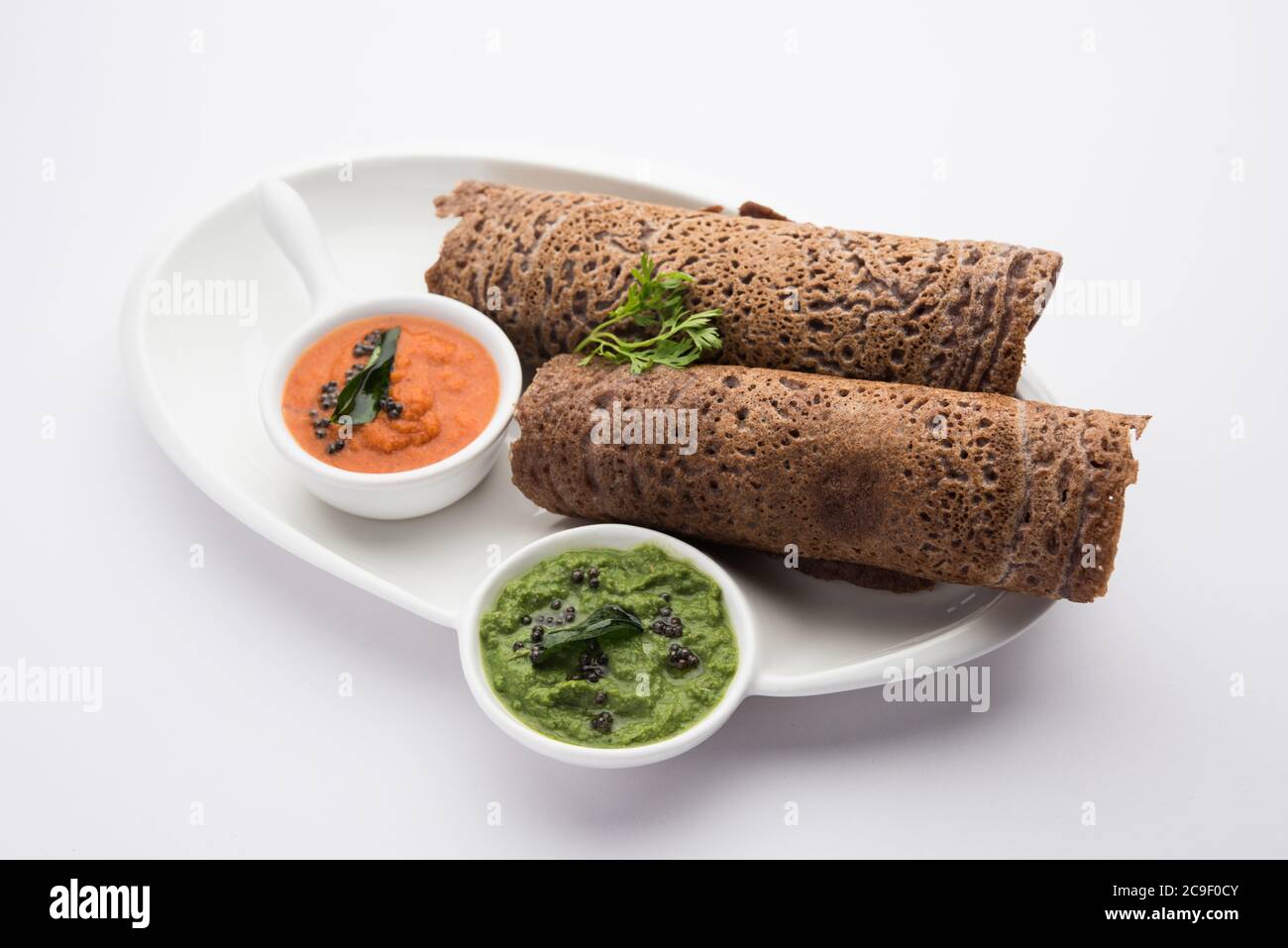 Finger Millet or Ragi Dosa is a healthy Indian breakfast served with ...